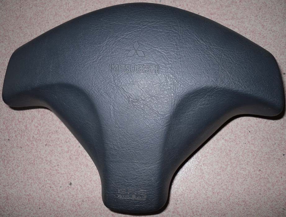 the airbag cover for Mitsubishi Lancer - driver side
